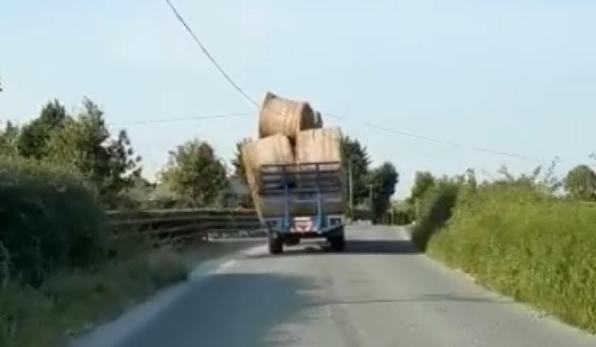 WATCH: Dangerous load of hay bales falling off trailer caught on video ...