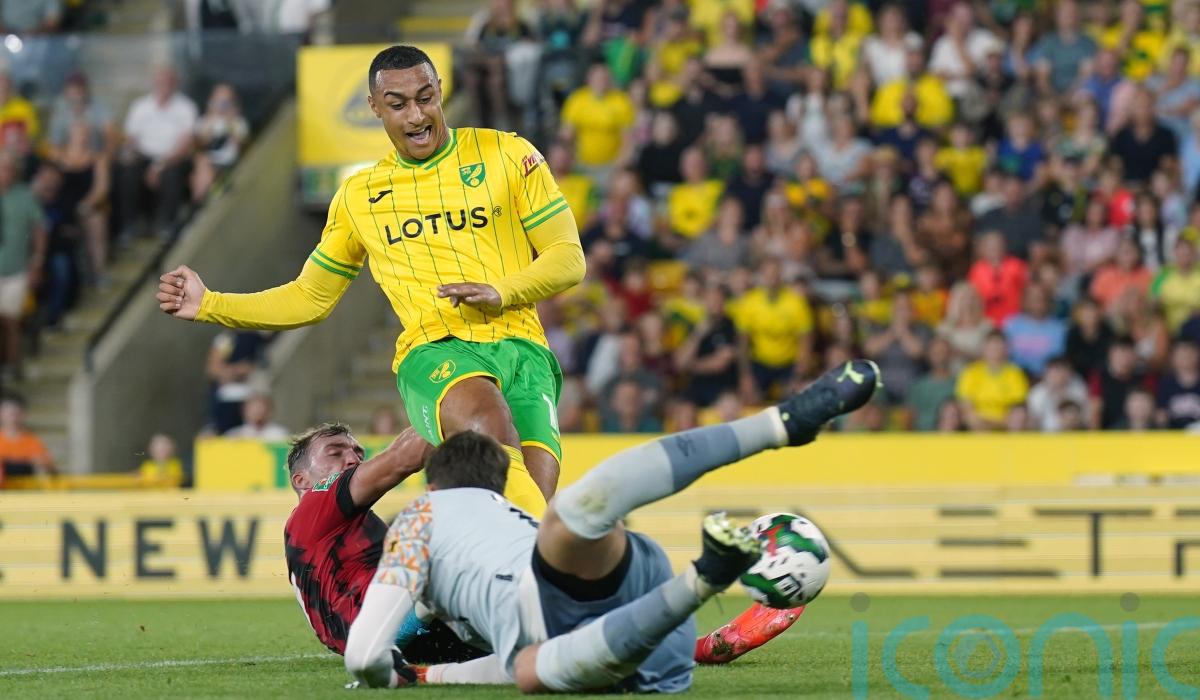 Republic of Ireland striker signs new contract to extend stay at Carrow ...